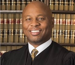 A parade of young defendants…and then, an old man steps forward ...